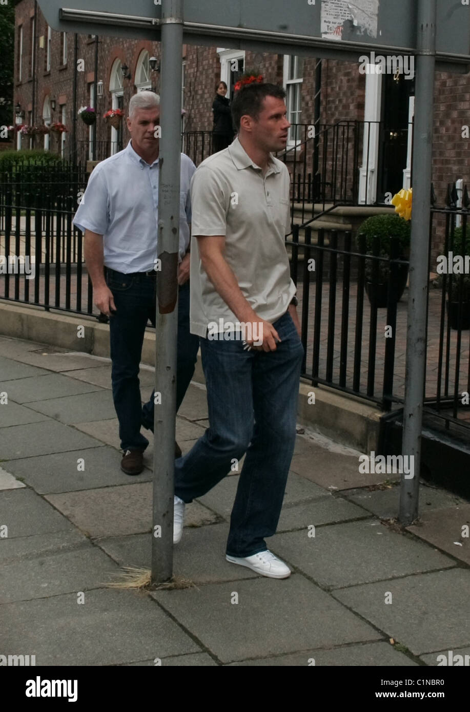 Liverpool star Jamie Carragher visits the home of jailed fan Michael ...