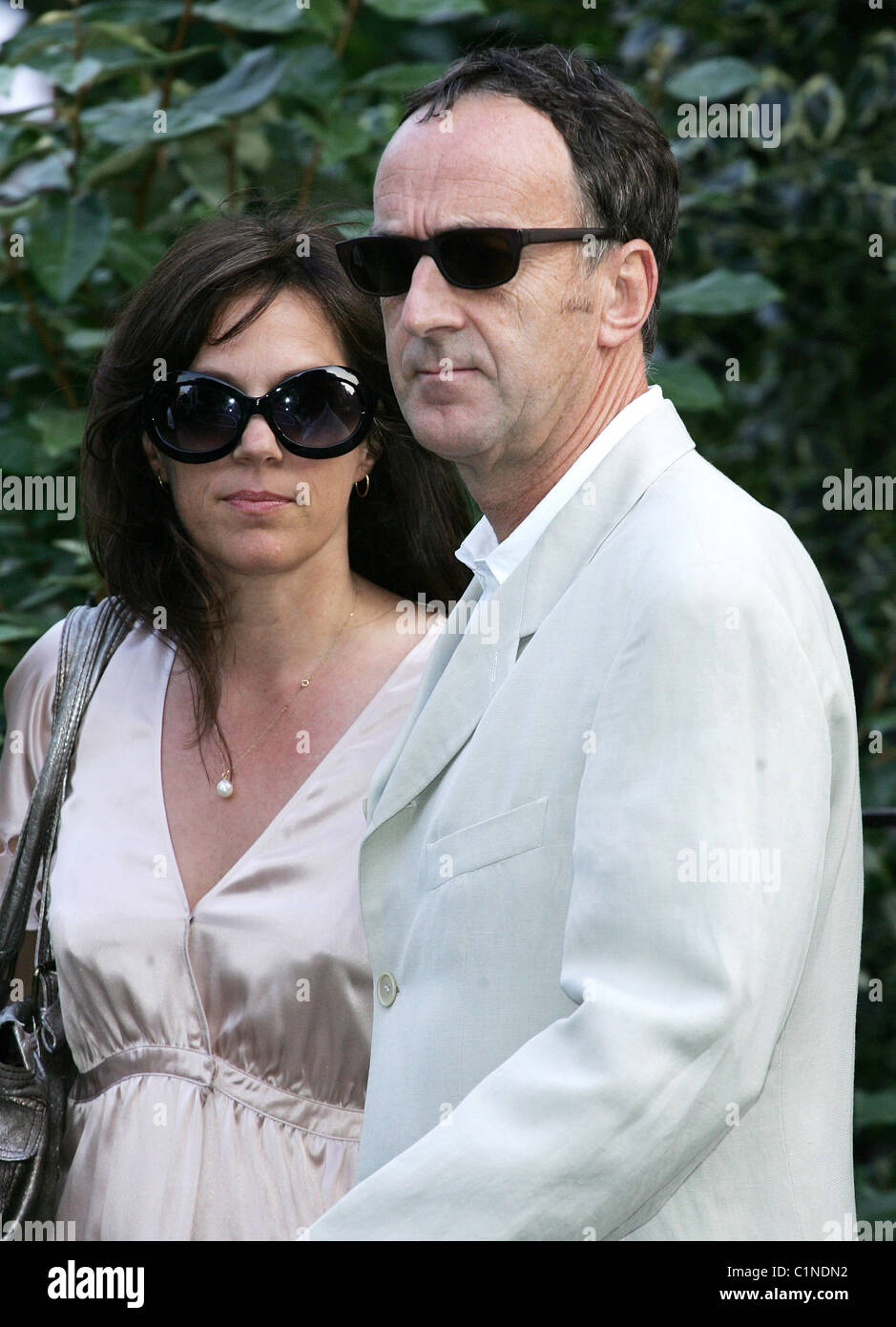 Angus Deayton, arrive at Sir David Frost's annual summer garden party ...