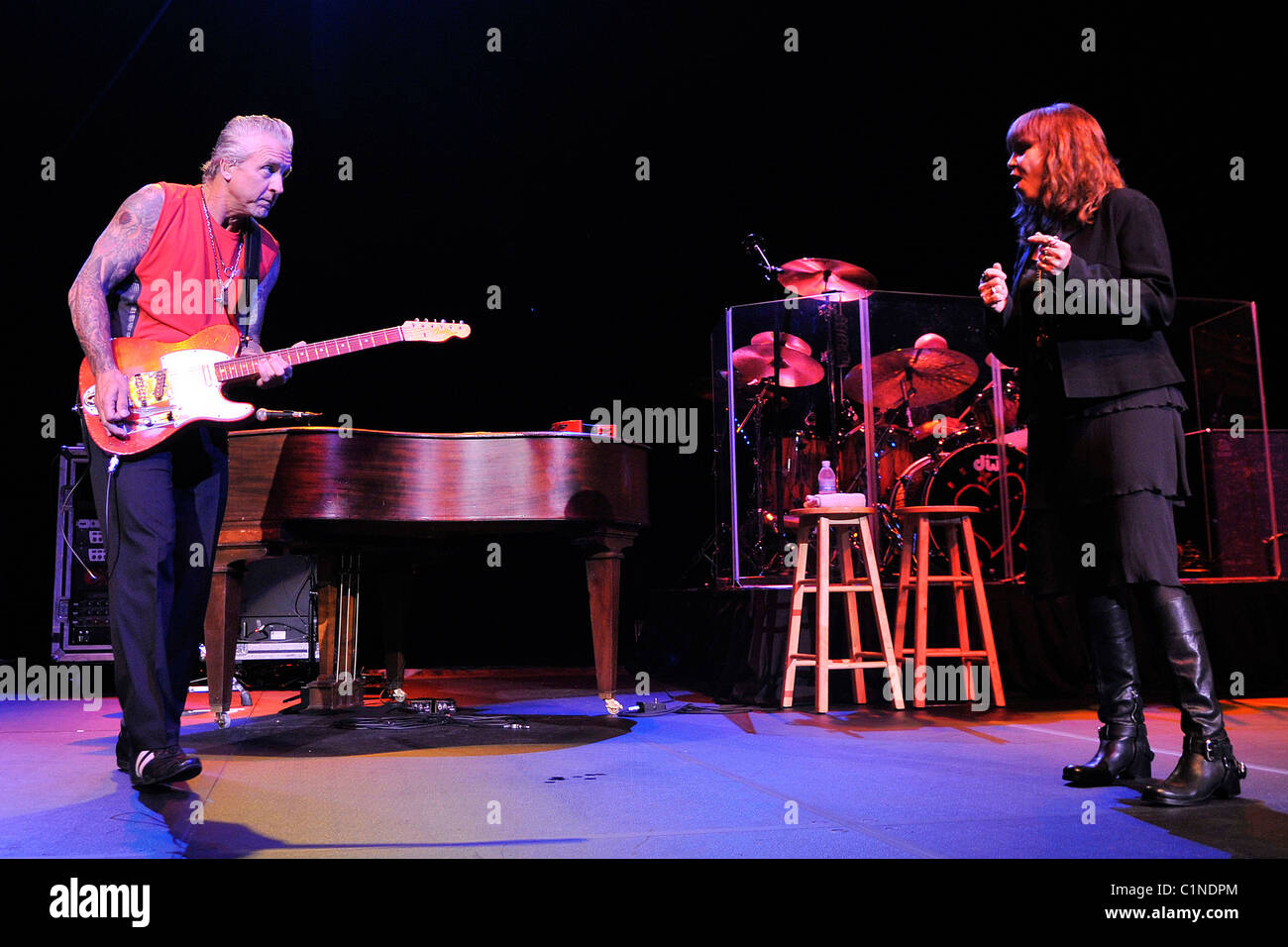 Pat Benatar and husband Neil Giraldo performing in 'Hard Rock Live ...