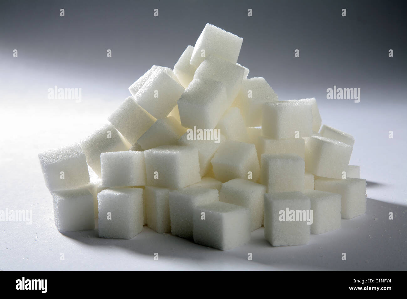 Pile of sugar cubes Stock Photo - Alamy