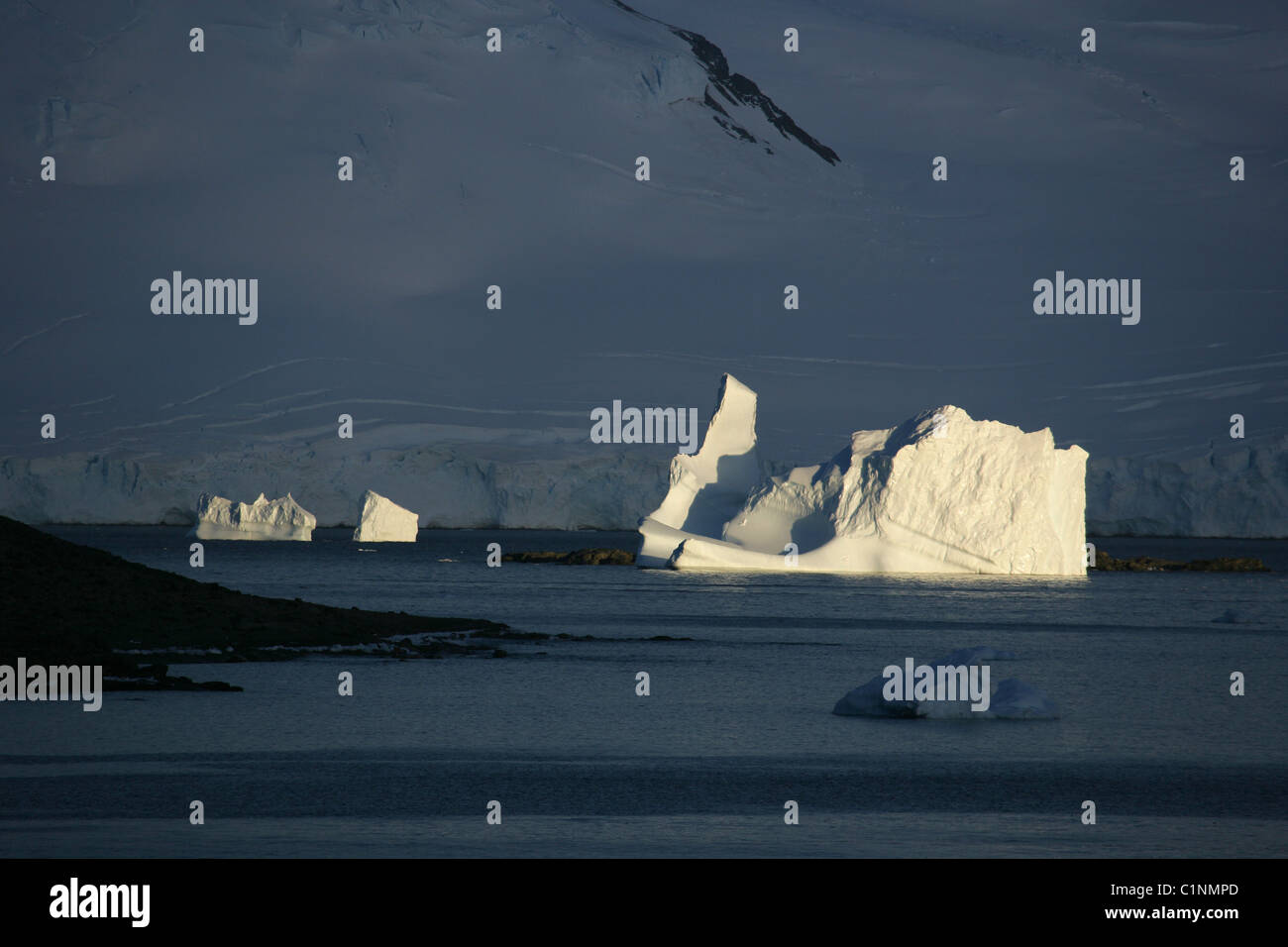 Spectacular angled sunlight on icebergs in [Marguerite Bay], [West ...