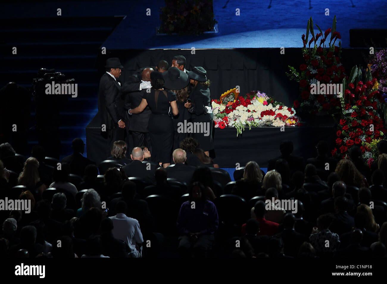 Jackson family members hug Usher The memorial service for the King of ...