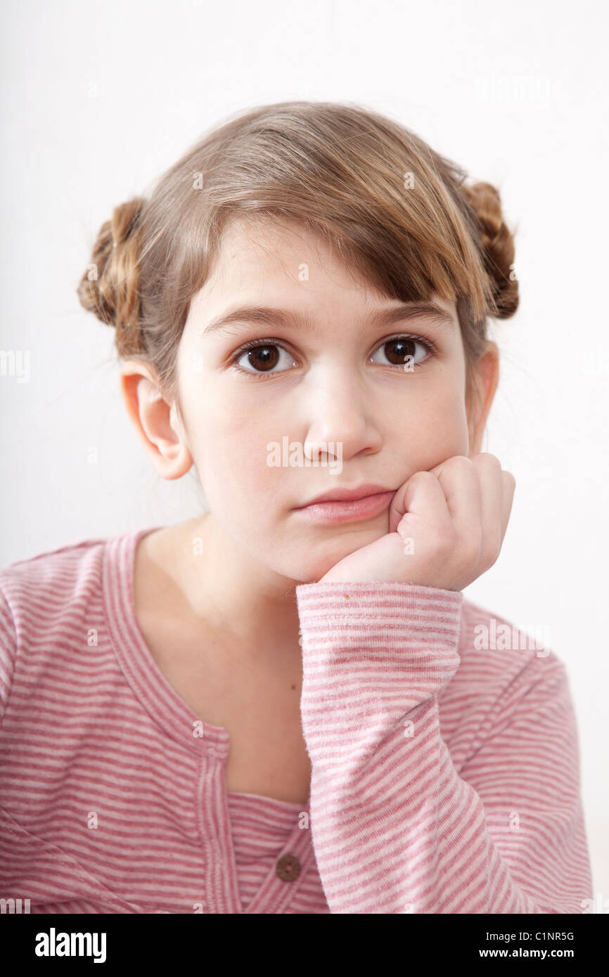 portrait of pensive girl with hair style Stock Photo - Alamy