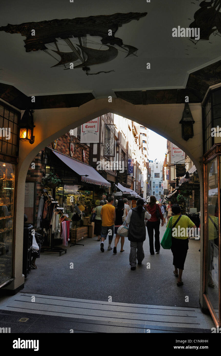 Shoppers and tourists in the Tudor styled street of London Court in ...
