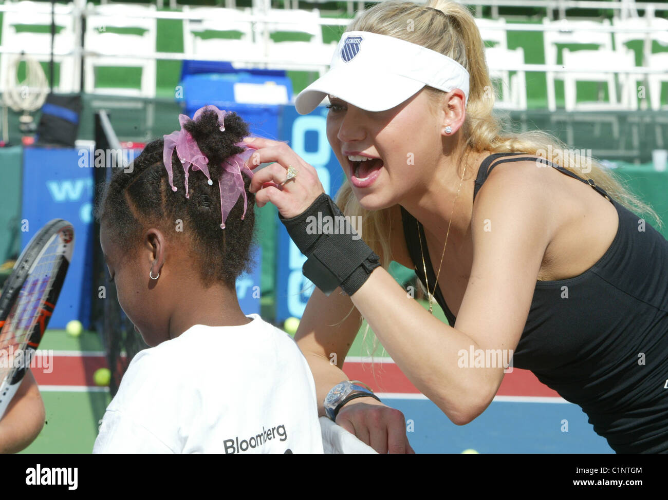 Anna Kournikova coaching the Bloomberg Kids Tennis Clinic at Kastles ...