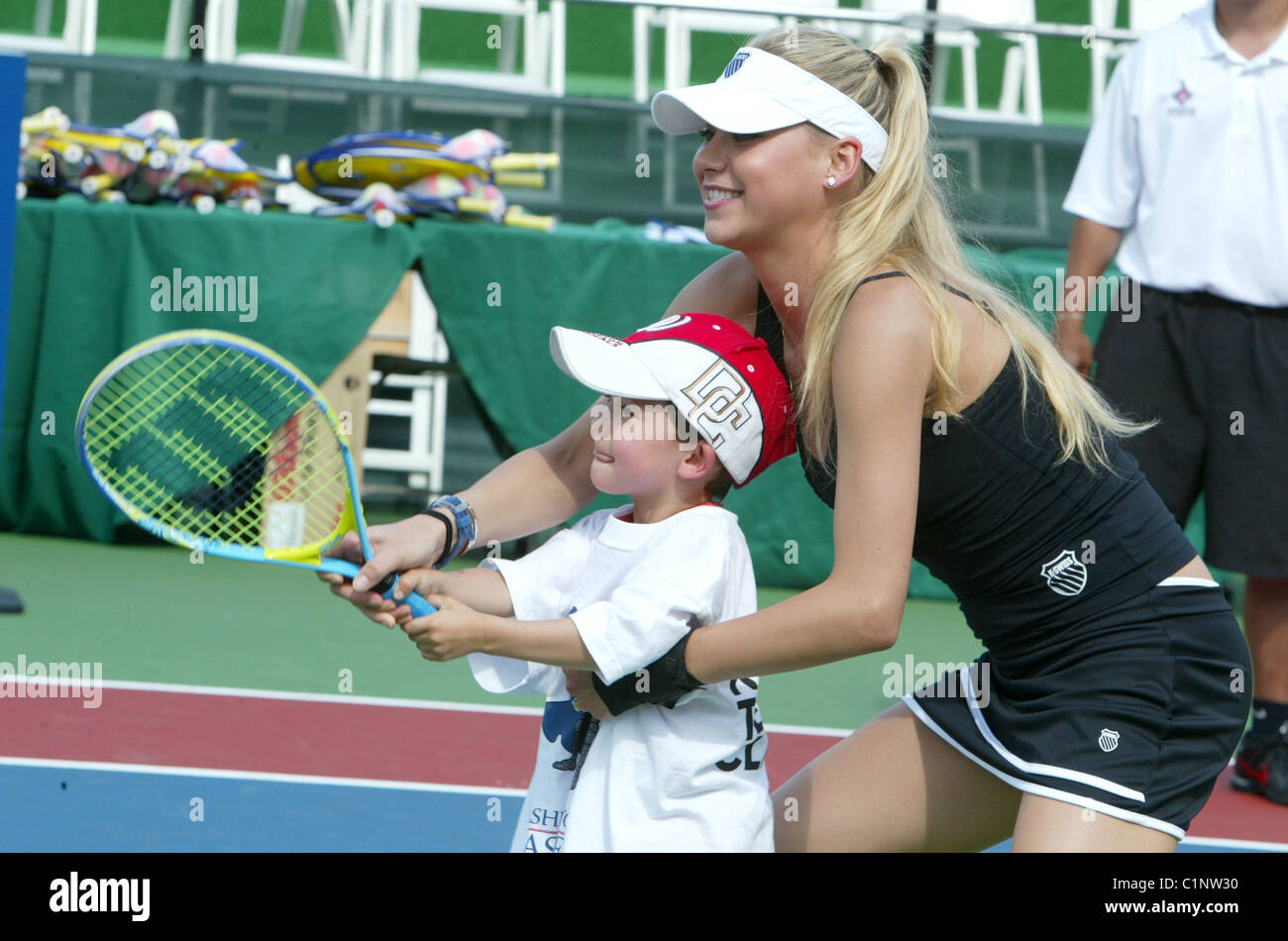 Anna Kournikova coaching the Bloomberg Kids Tennis Clinic at Kastles ...