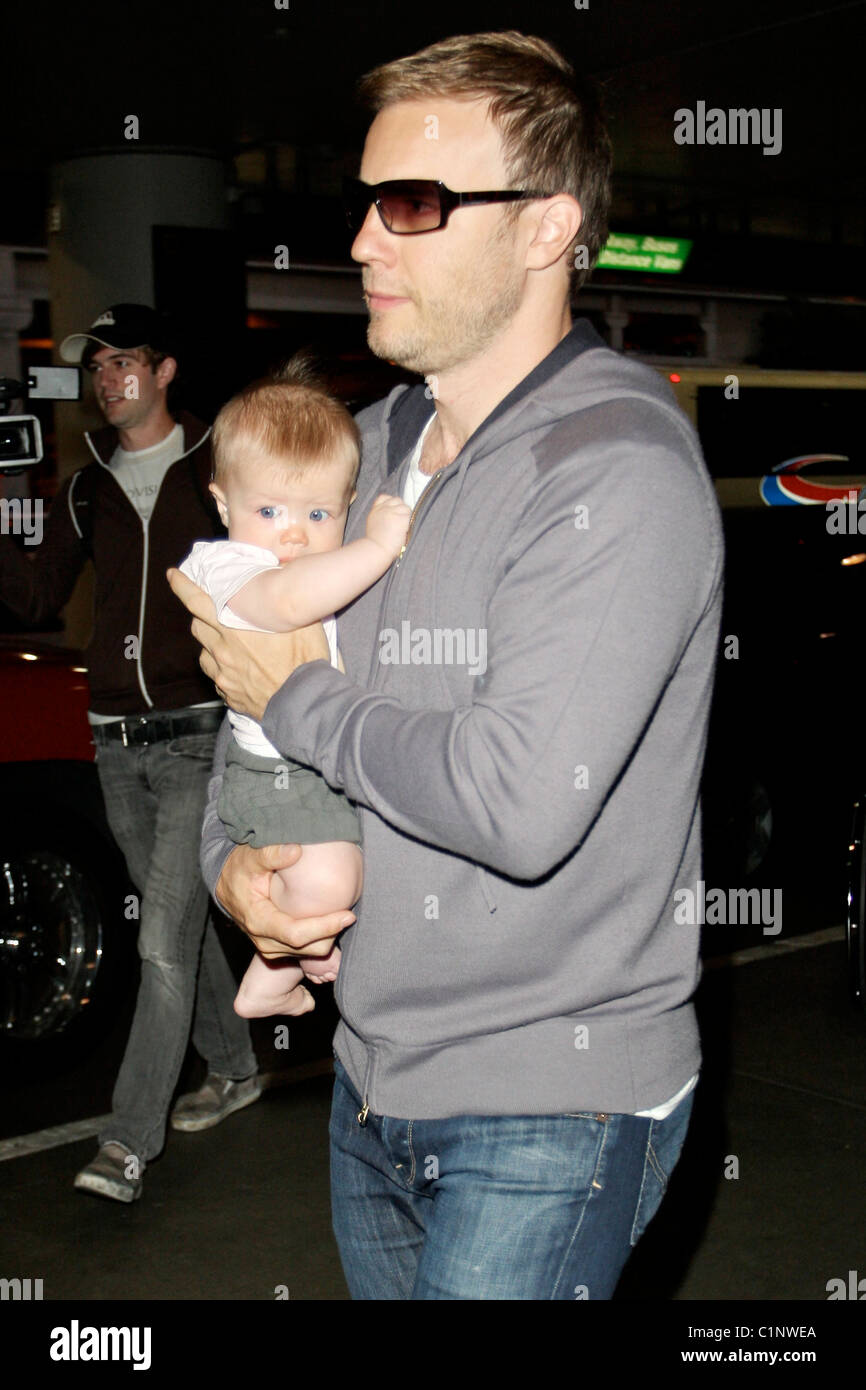 Gary Barlow and family arriving at LAX airport on a British Airways ...