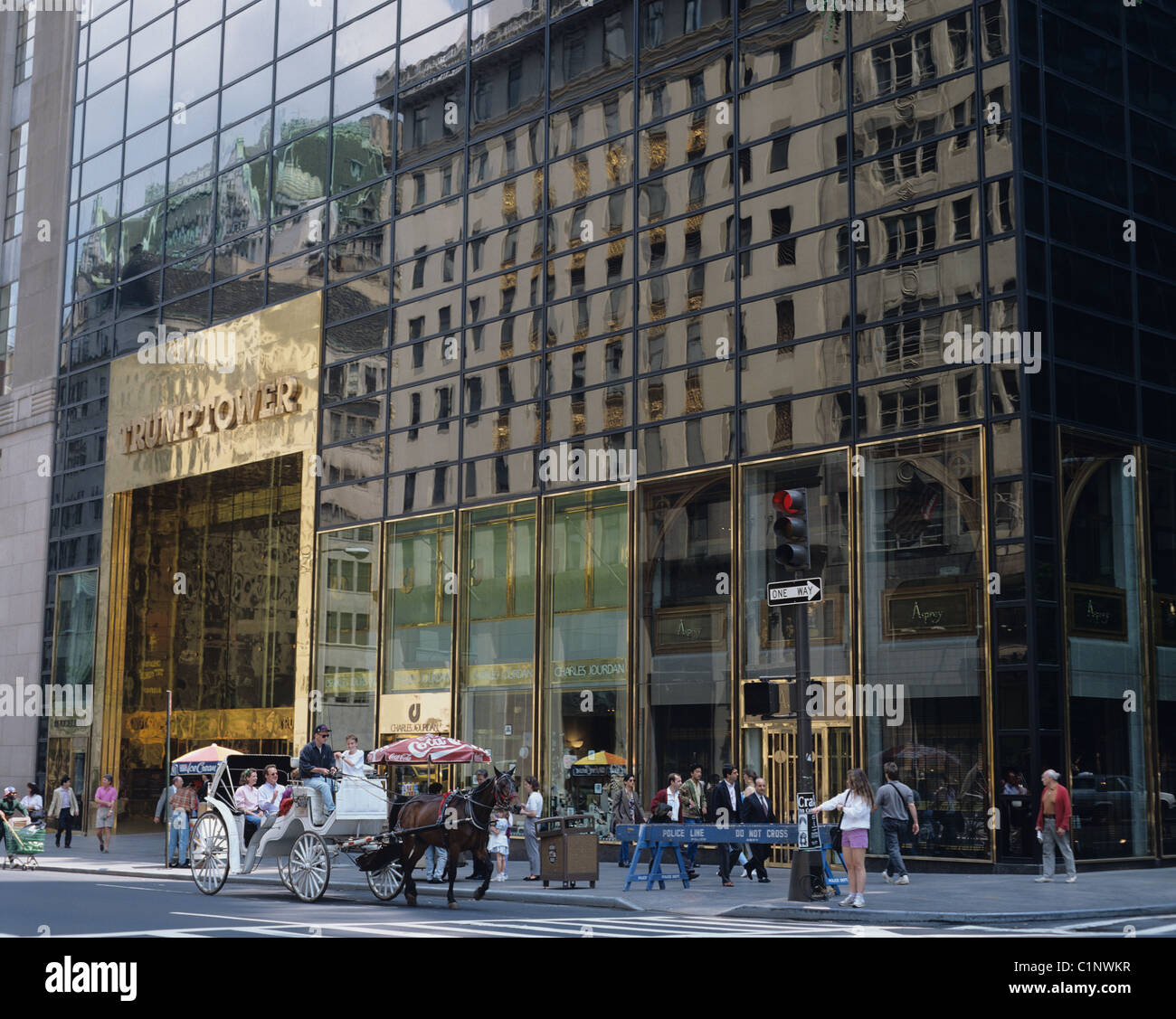 Horse-drawn carriage in front of Trump Tower entrance. New York city ...