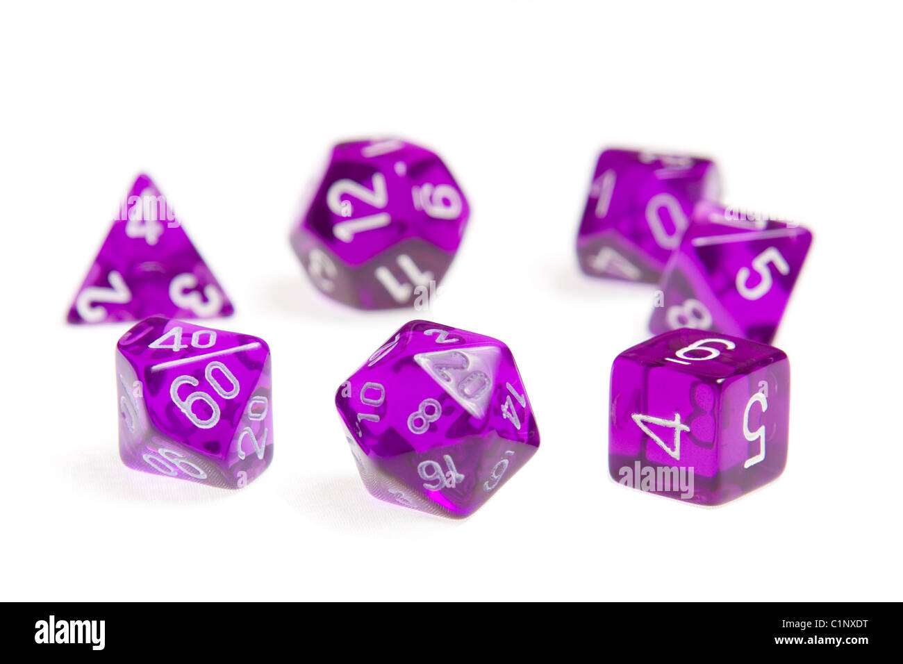 Seven purple polyhedral dice isolated on a white background Stock Photo ...