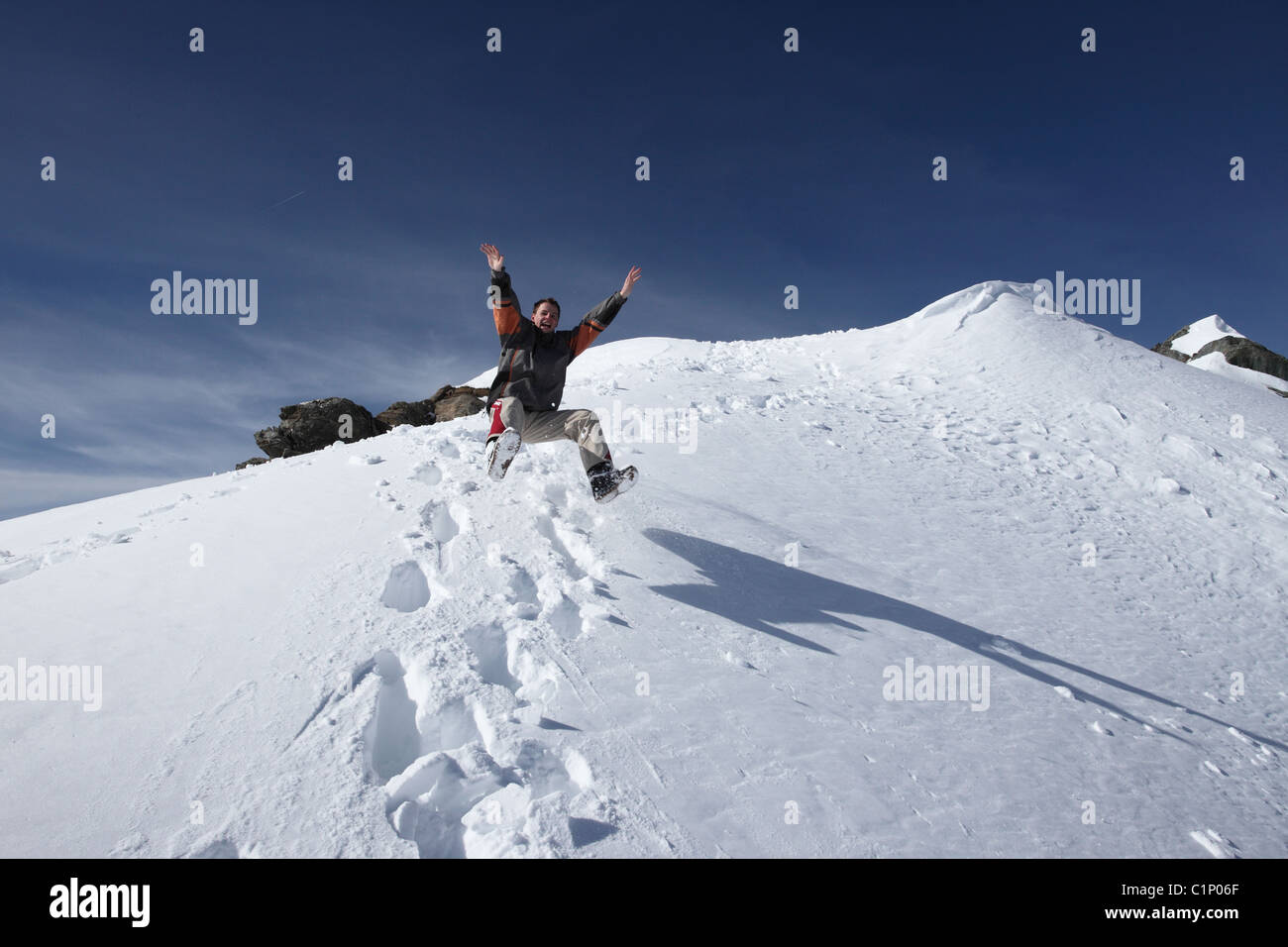 Jump into the snow Stock Photo - Alamy