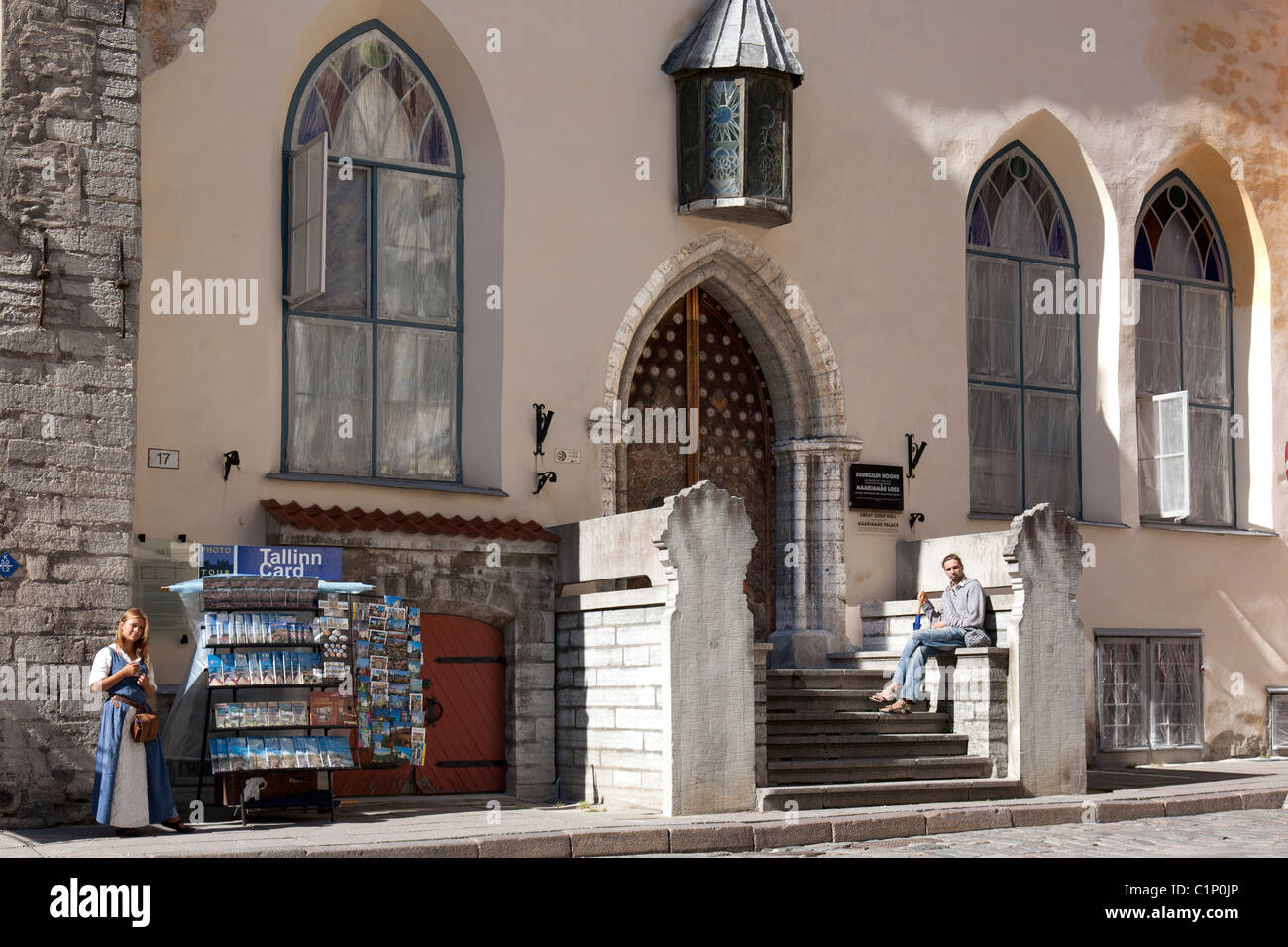 Young Woman Street Vendor Selling a Postcards in Old Medieval Tallinn ...