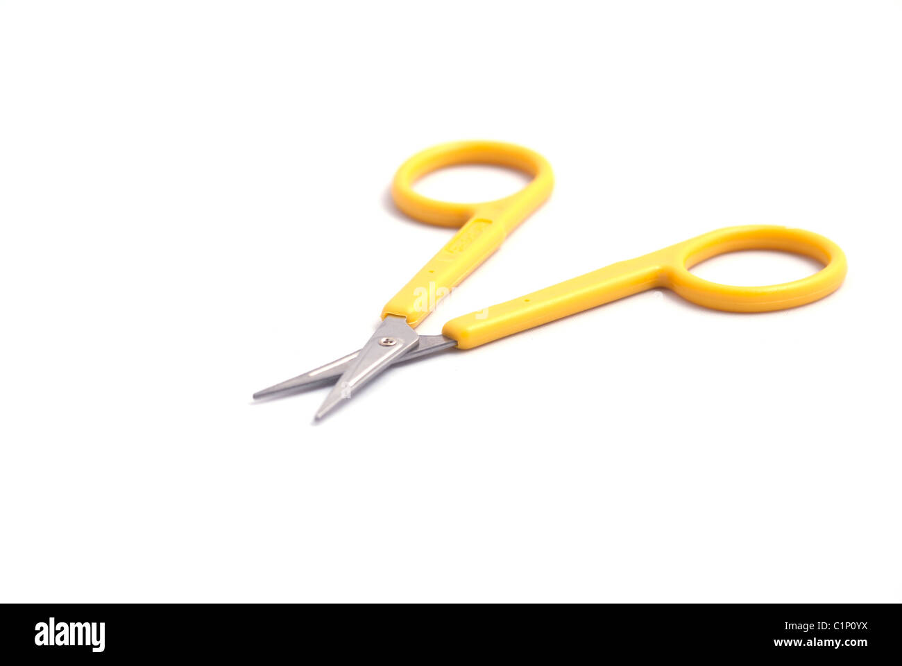 Yellow medical scissors Stock Photo - Alamy