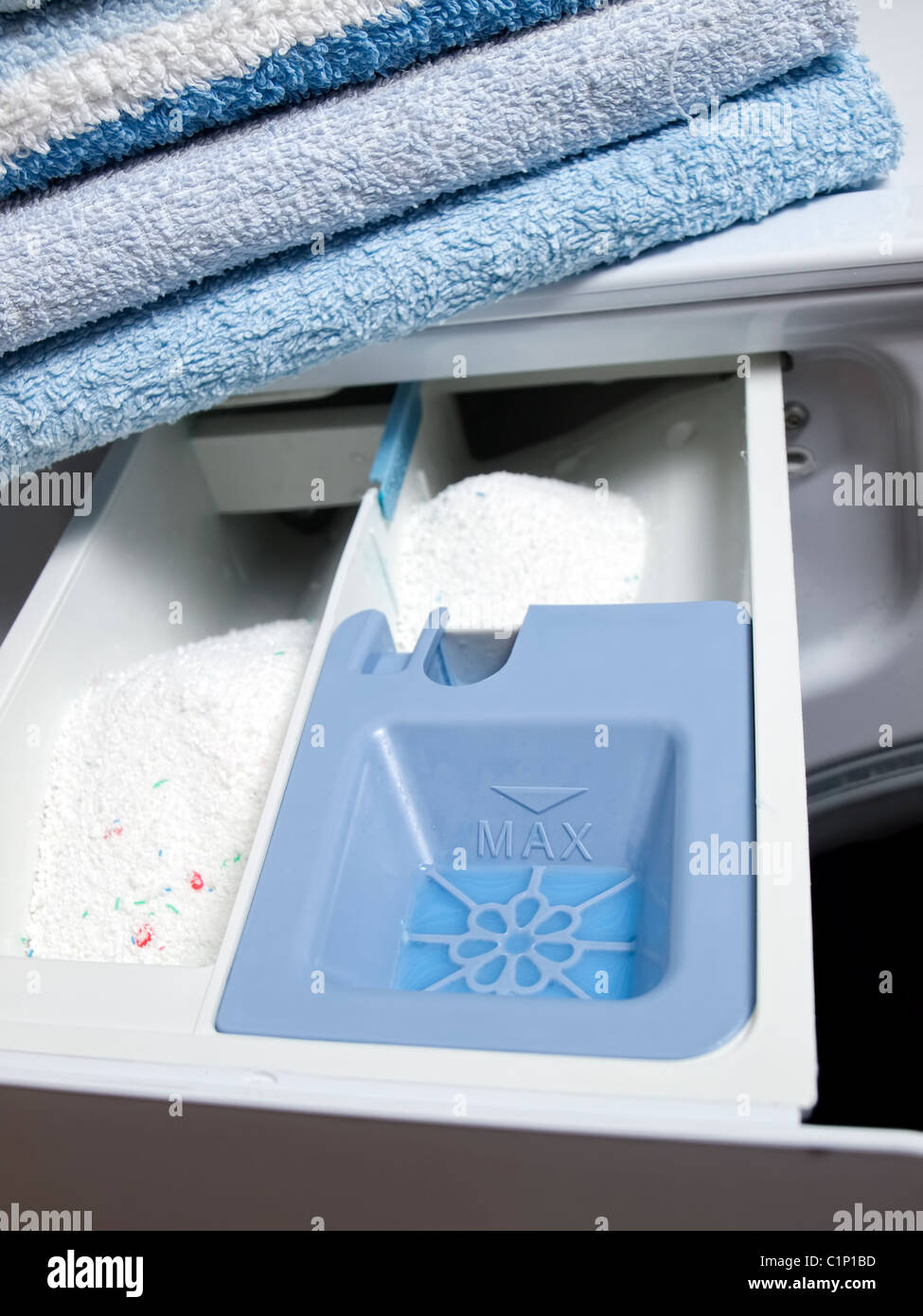 Closeup view of tubs for dispensing detergent in a washing machine ...