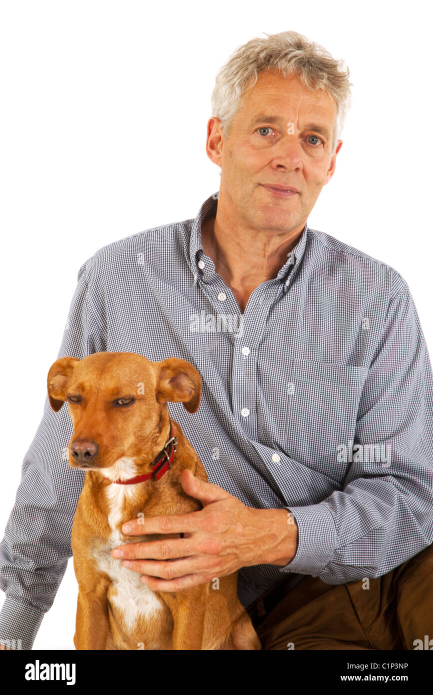 Elderly man with his little brown dog Stock Photo - Alamy
