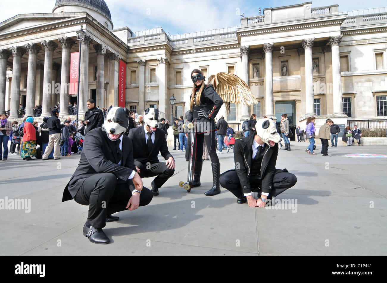 wolves wolf eagle london promotional event costume Stock Photo - Alamy