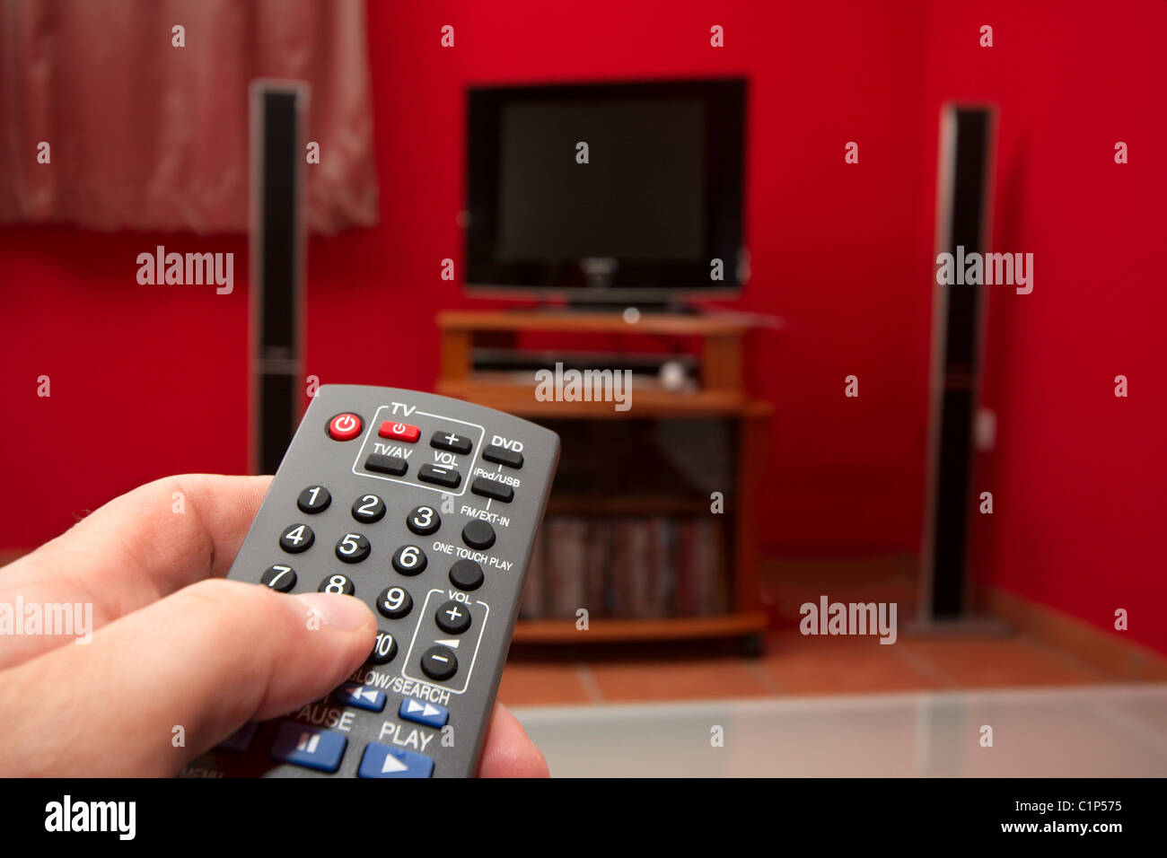 Tv remote in red hi-res stock photography and images - Alamy