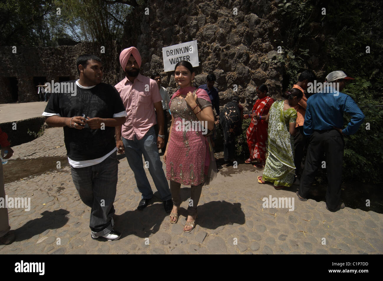 People enjoy the tourist attraction of the Rock Garden in Chandigarh ...