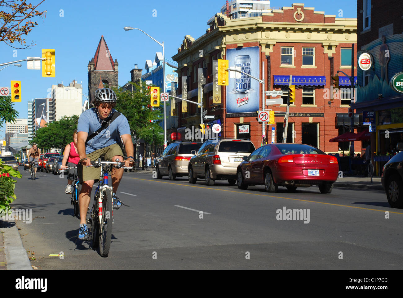 Cyclists riding on street, downtown Toronto Stock Photo - Alamy