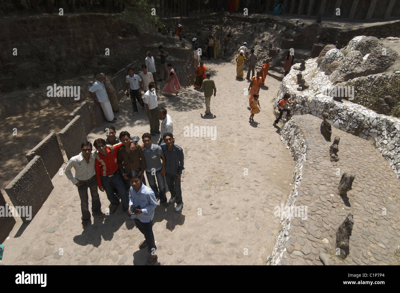 People enjoy the tourist attraction of the Rock Garden in Chandigarh ...