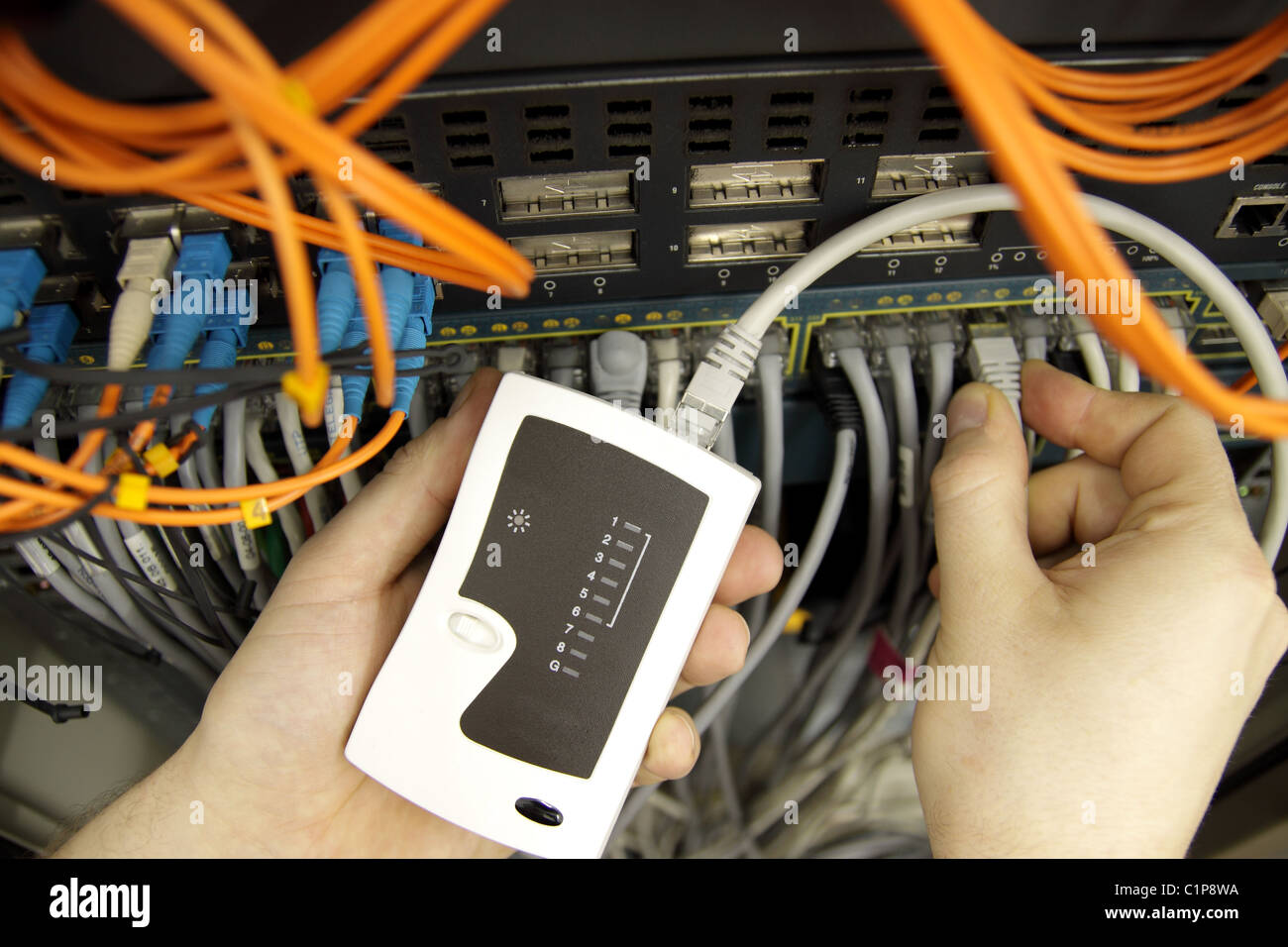 IT is testing a network switch on the server Stock Photo - Alamy