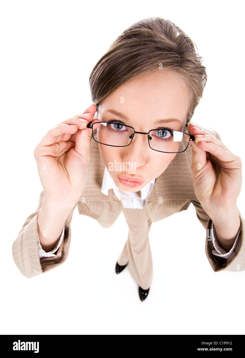 Wide angle of businesswoman wearing eyeglasses and keeping her lips in ...