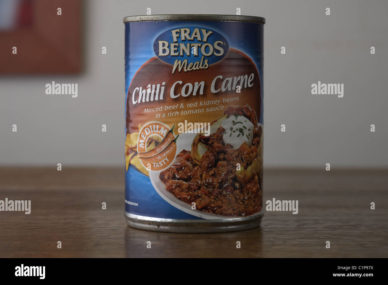 Tinned food on an oak wood table Stock Photo - Alamy