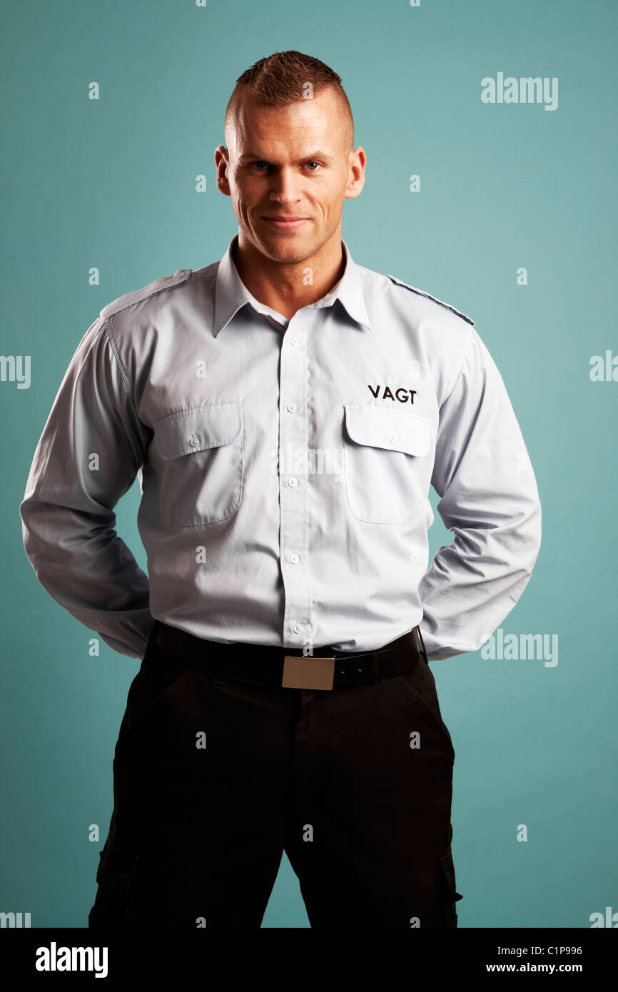 Studio portrait of security guard Stock Photo - Alamy