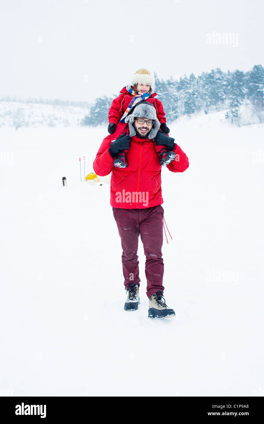 Father carries child on shoulders hi-res stock photography and images ...