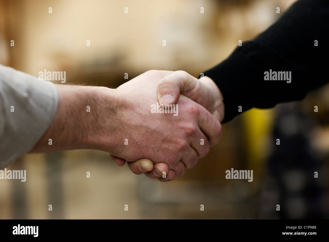Close-up of handshake Stock Photo - Alamy