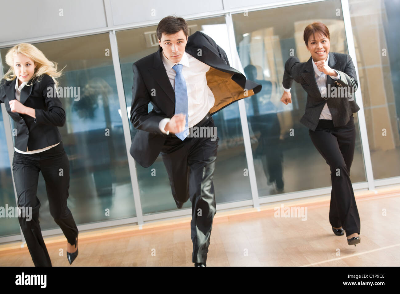 Business people running workers hi-res stock photography and images - Alamy