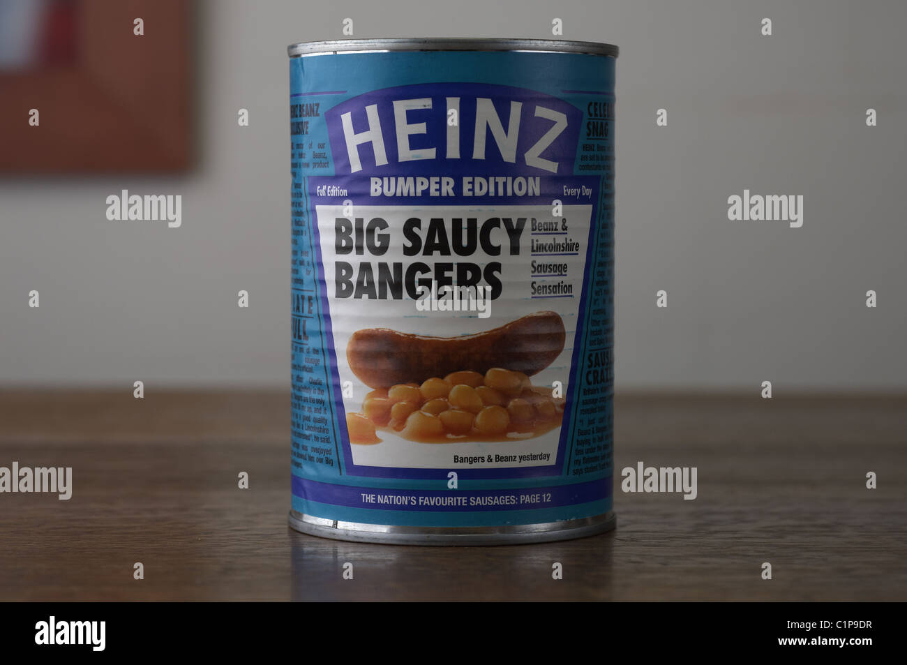 Tinned food on an oak wood table Stock Photo - Alamy