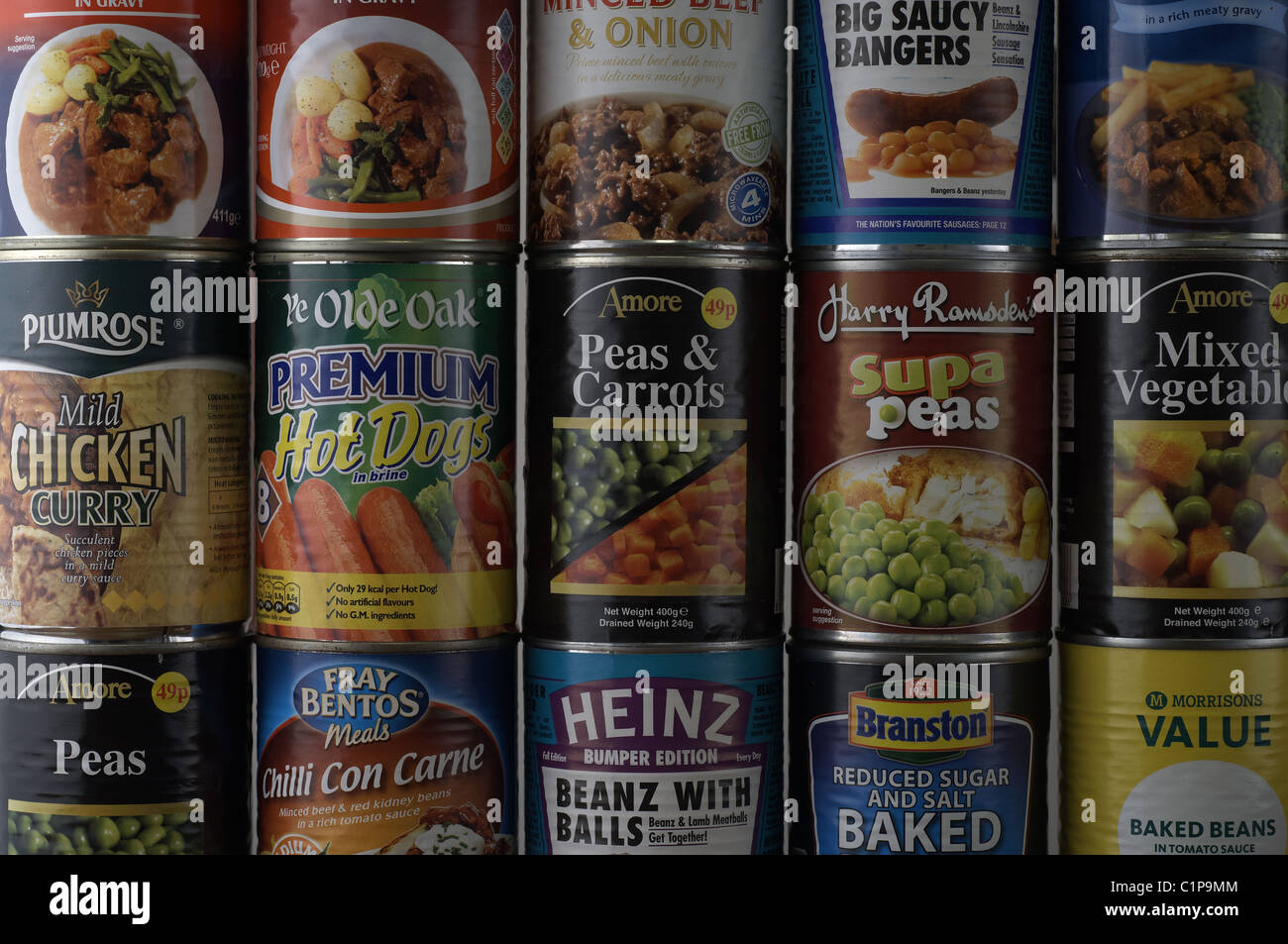 Tinned food on an oak wood table Stock Photo - Alamy