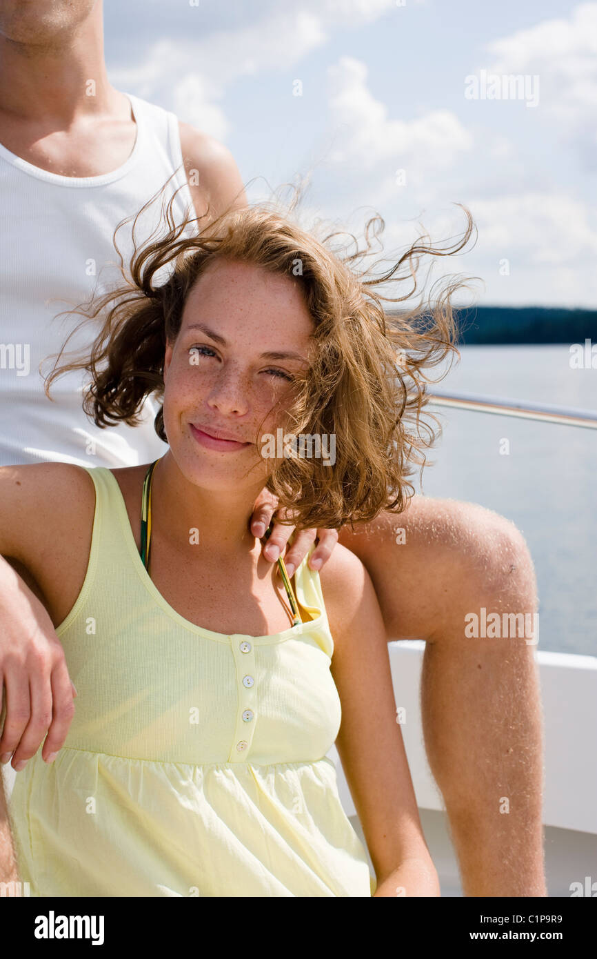 Portrait of woman relaxing in boat on sea Stock Photo - Alamy