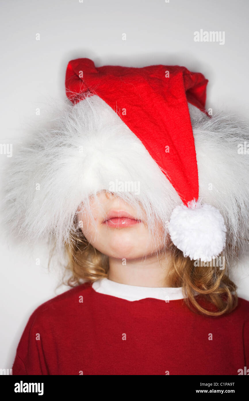 Red santa hat over hi-res stock photography and images - Alamy