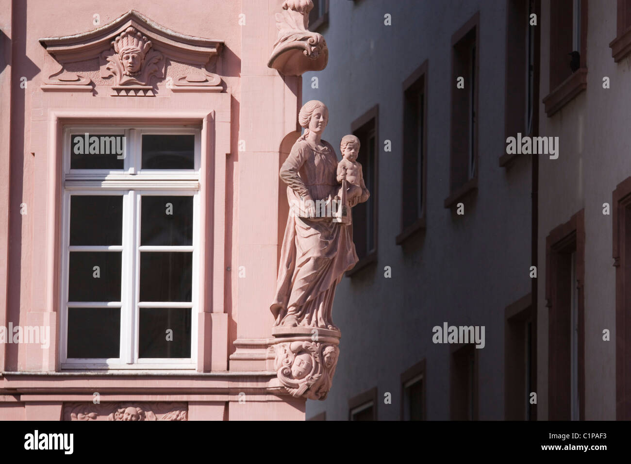Germany, Mainz, facade of Renaissance building with statue and closed ...