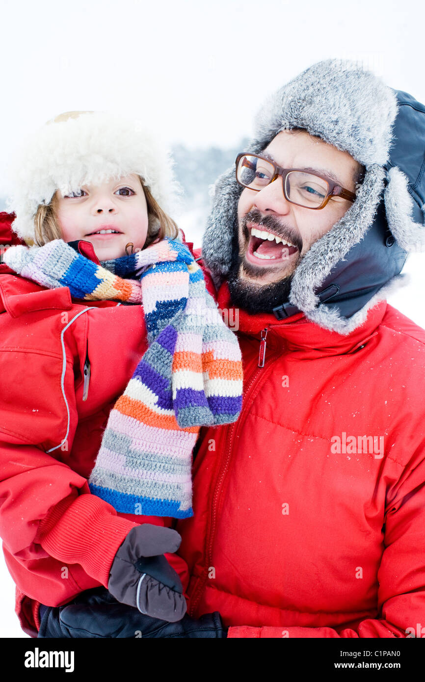 Father and daughter in winter clothing Stock Photo - Alamy