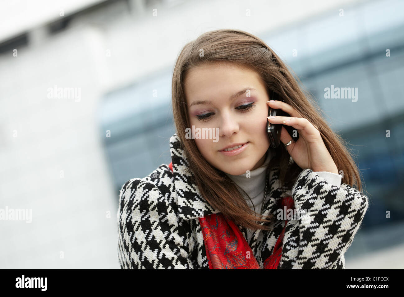 Young woman with mobile phone Stock Photo - Alamy