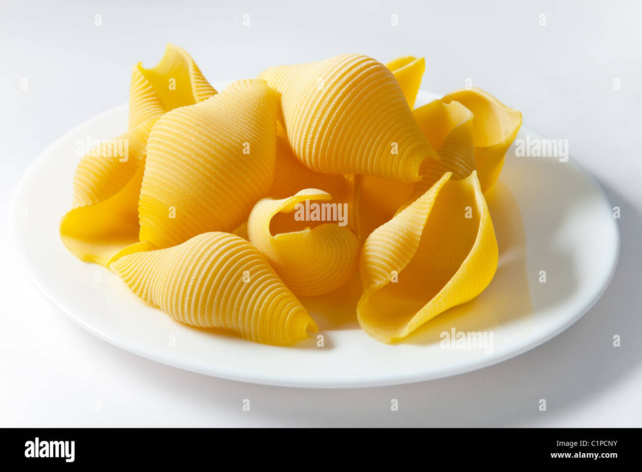 "shell" pasta on a plate Stock Photo - Alamy