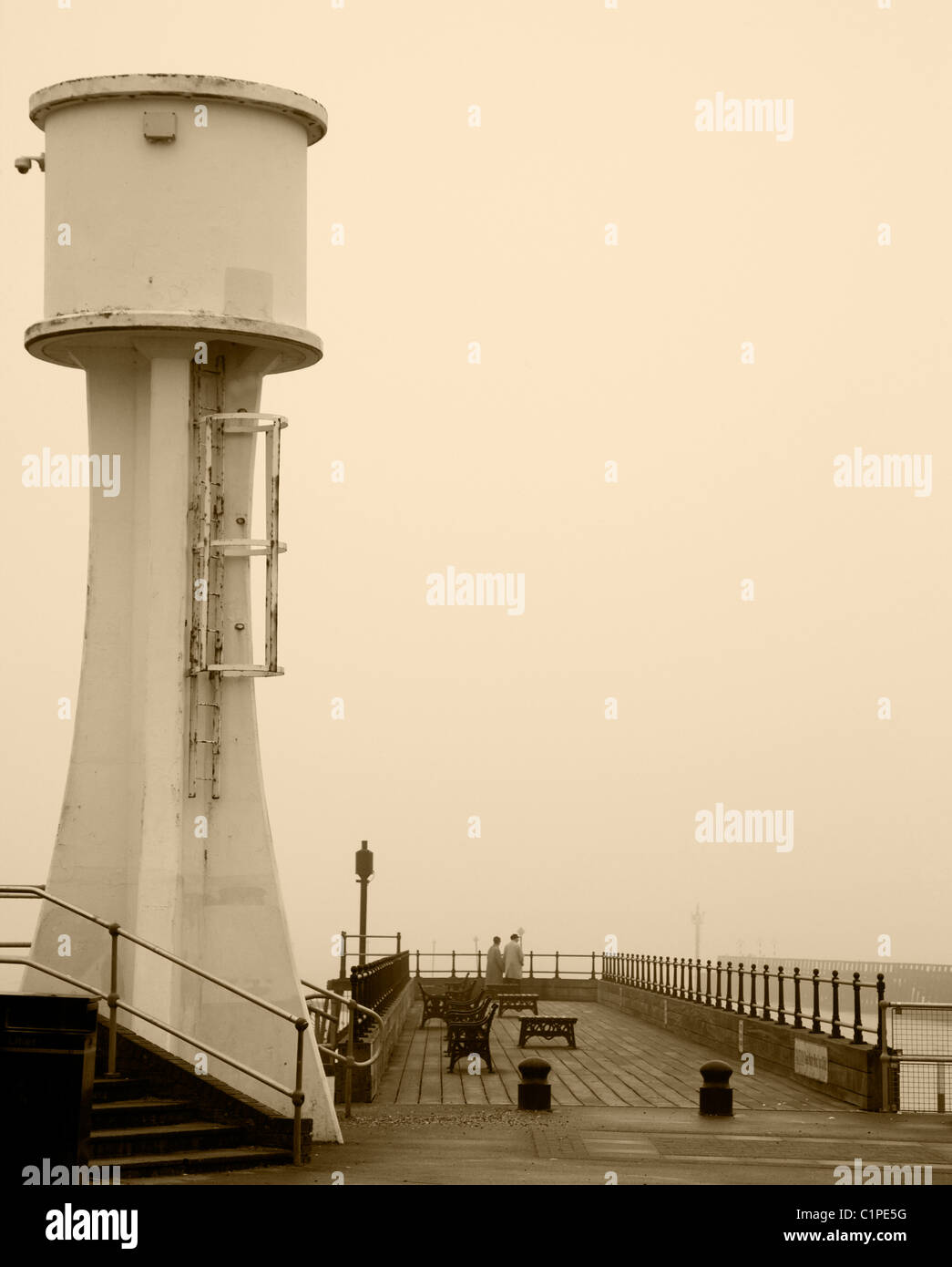 Littlehampton Lighthouse and Pier on a Misty Day in Sepia Stock Photo ...