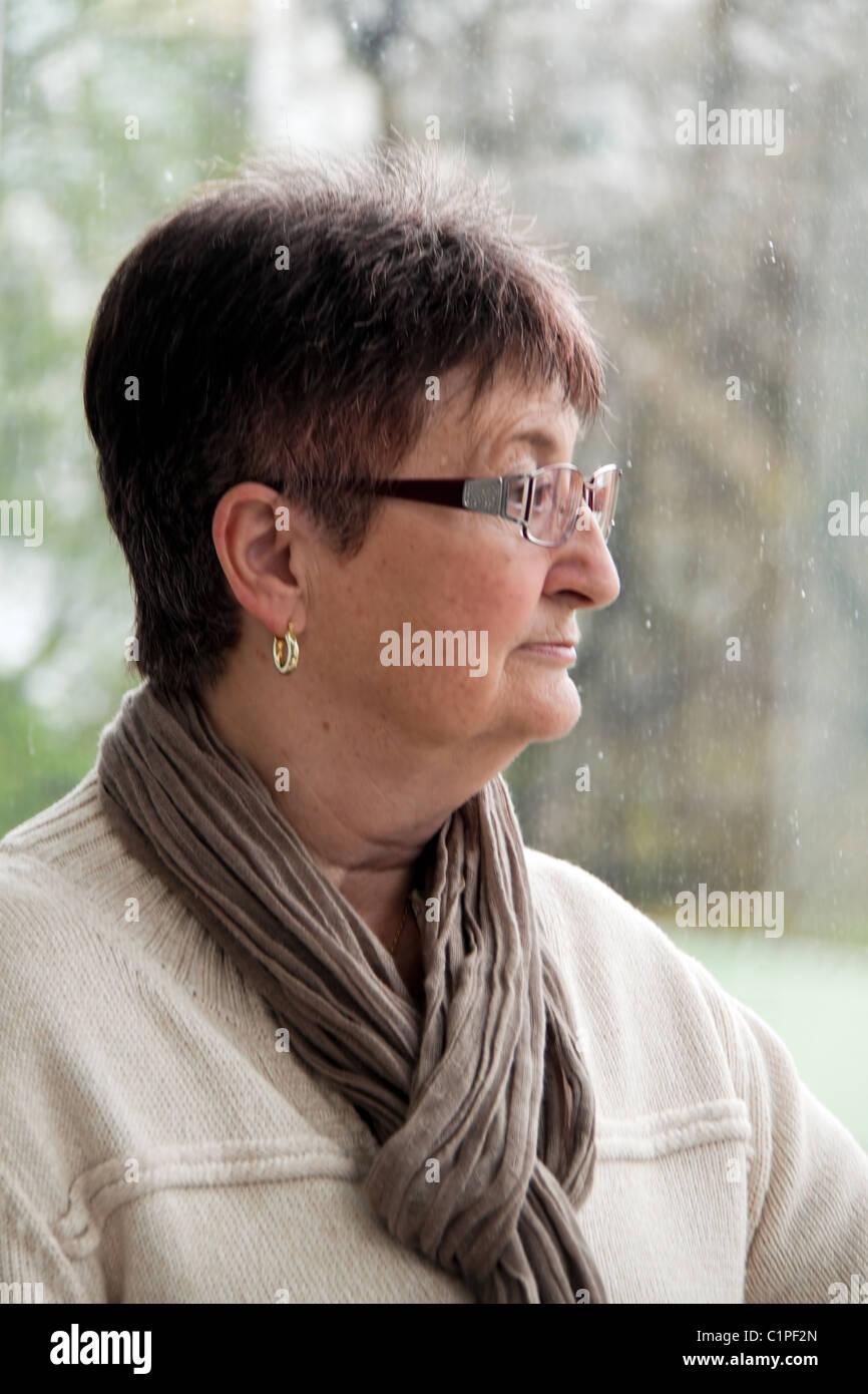 Senior citizen is lonely, depressed, sad case of window Stock Photo - Alamy