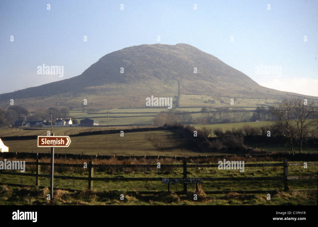 Slemish Mountain and road sign, Co. Antrim, Northern Ireland, UK. The ...