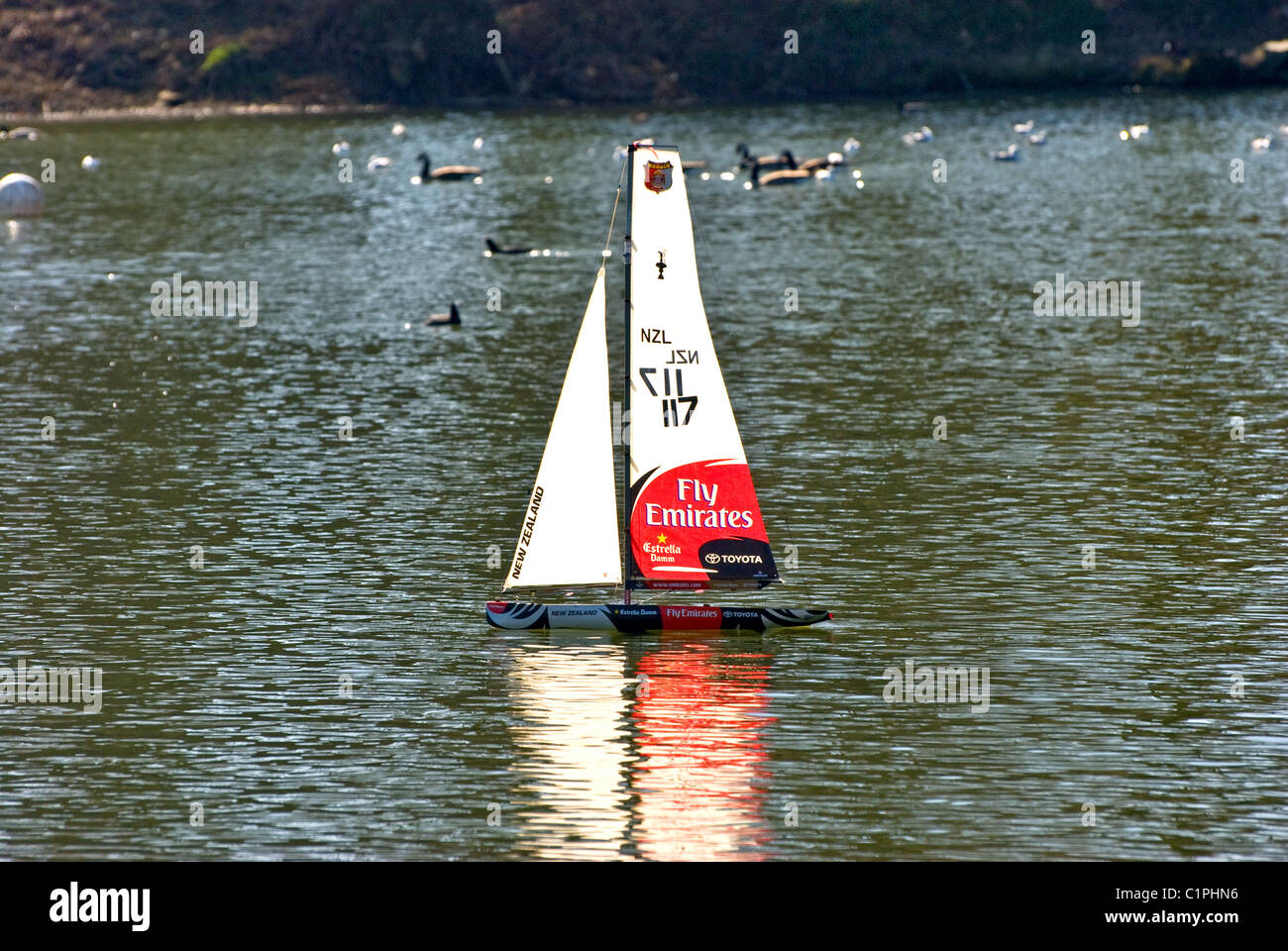 Model yachts on a boating lake Stock Photo - Alamy