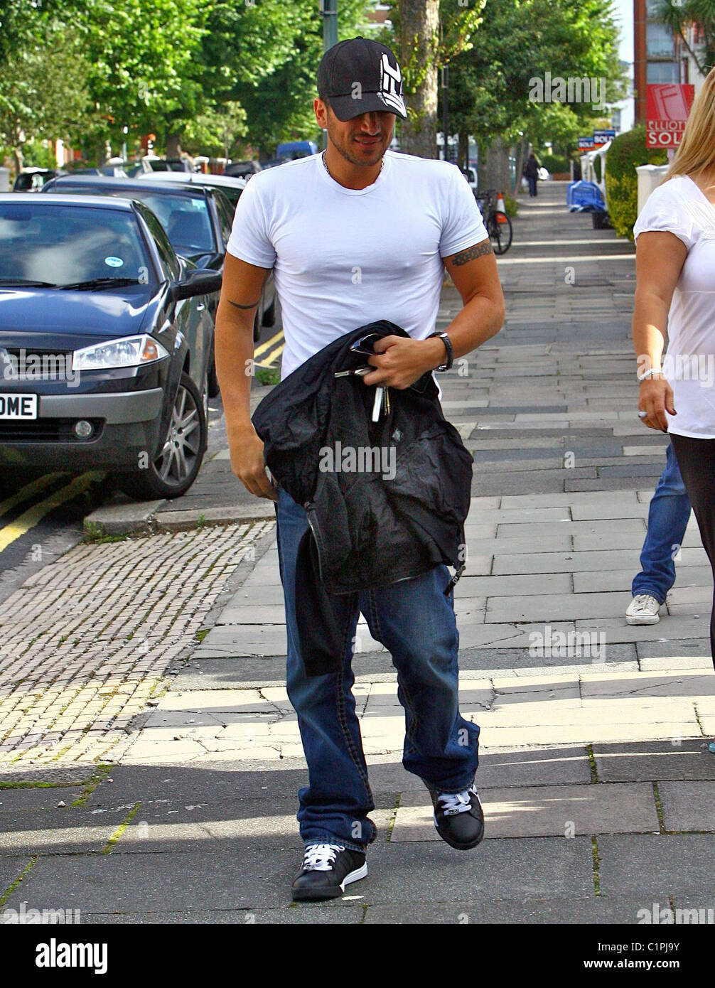 Peter Andre arrives at a house in London with his manager Claire Powell ...