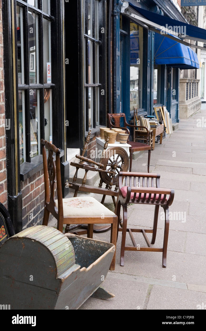 England, Peak District, Ashbourne, items on pavement outside antique ...
