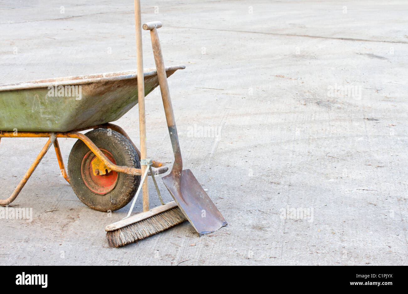 Wheelbarrow with tools Stock Photo - Alamy