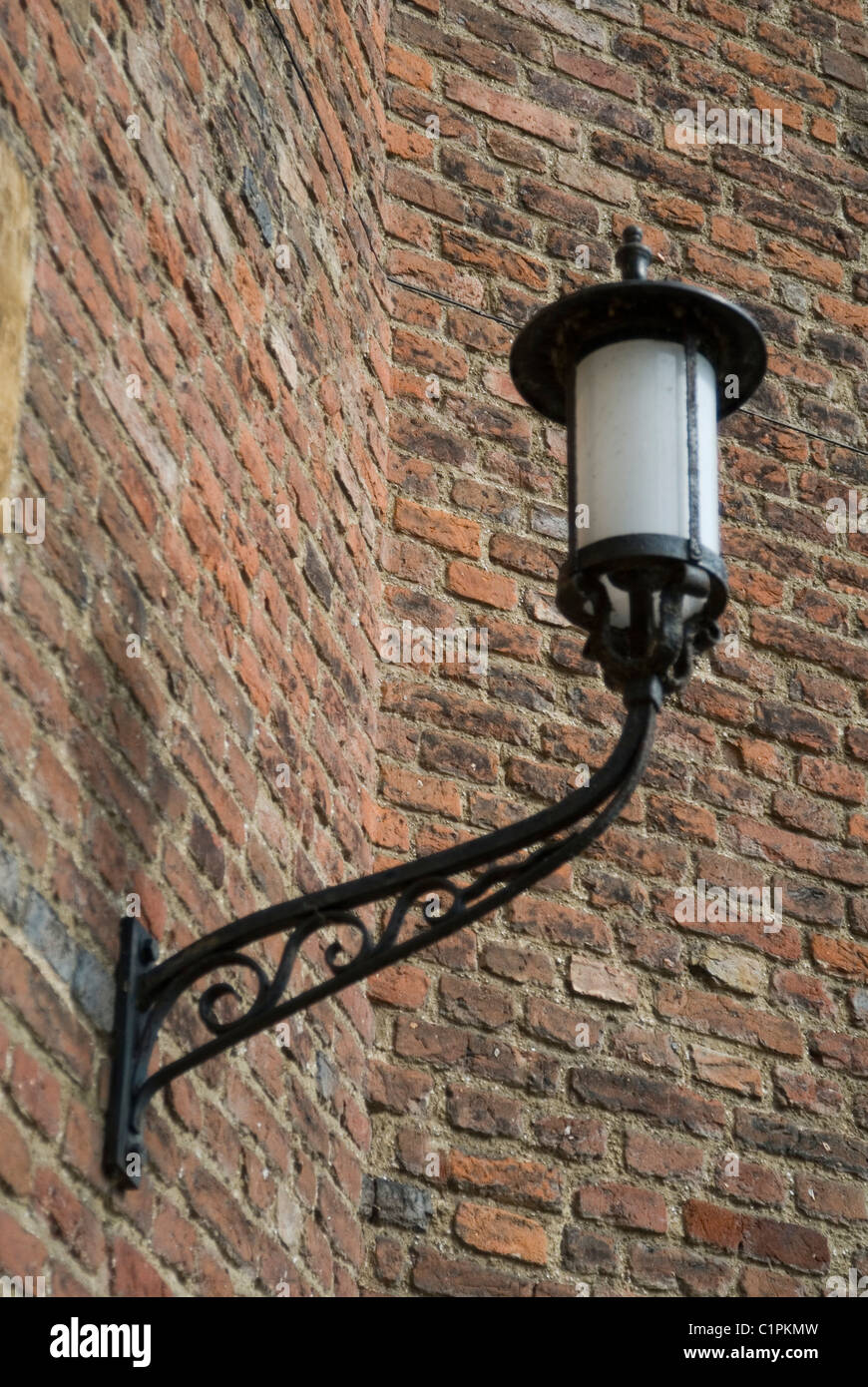 England, Cambridge, lamp on brick wall Stock Photo - Alamy