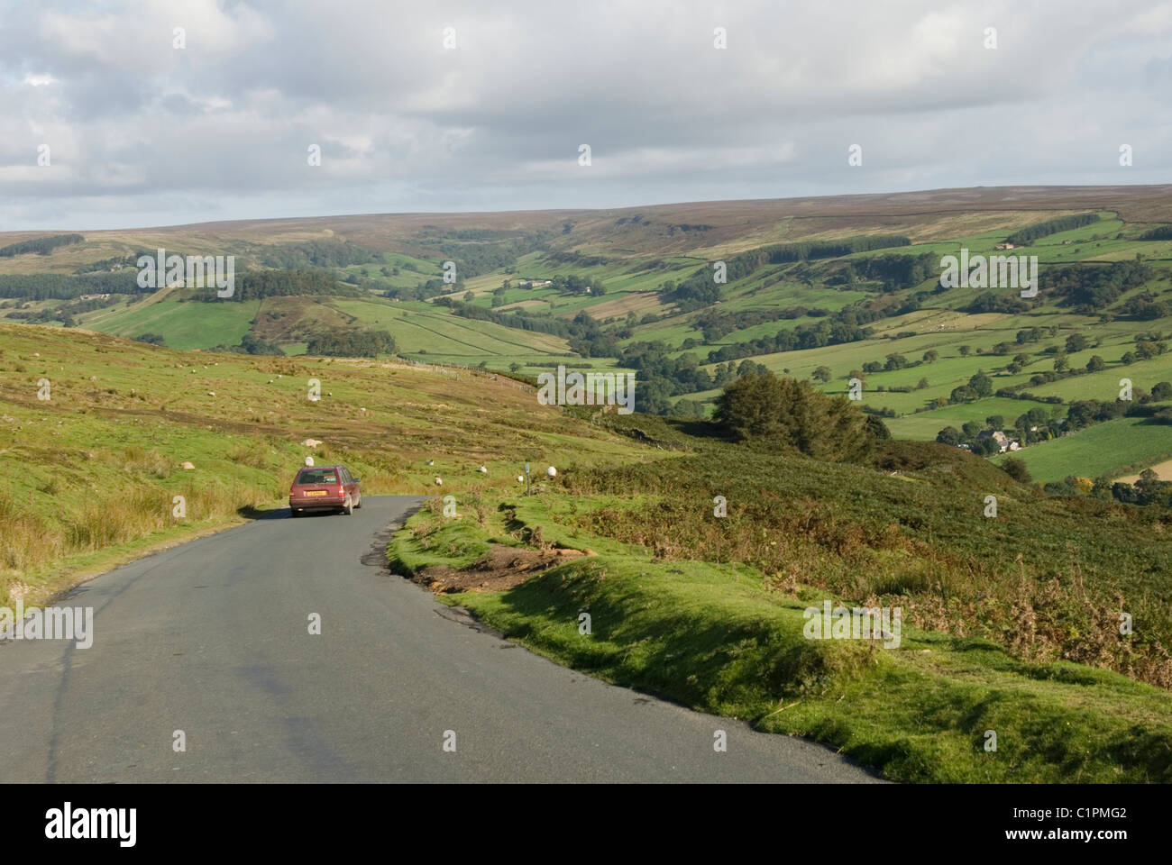 England, North Yorkshire, car on road over Rosedale Chimney Bank Stock ...