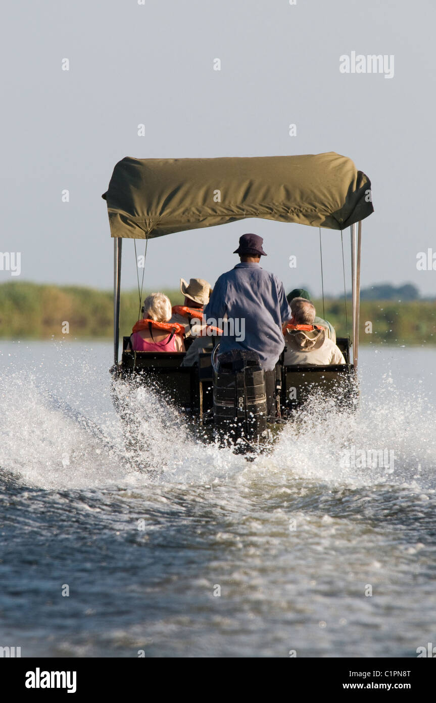 tourist excursion boat on the okavango river in botswana Stock Photo ...