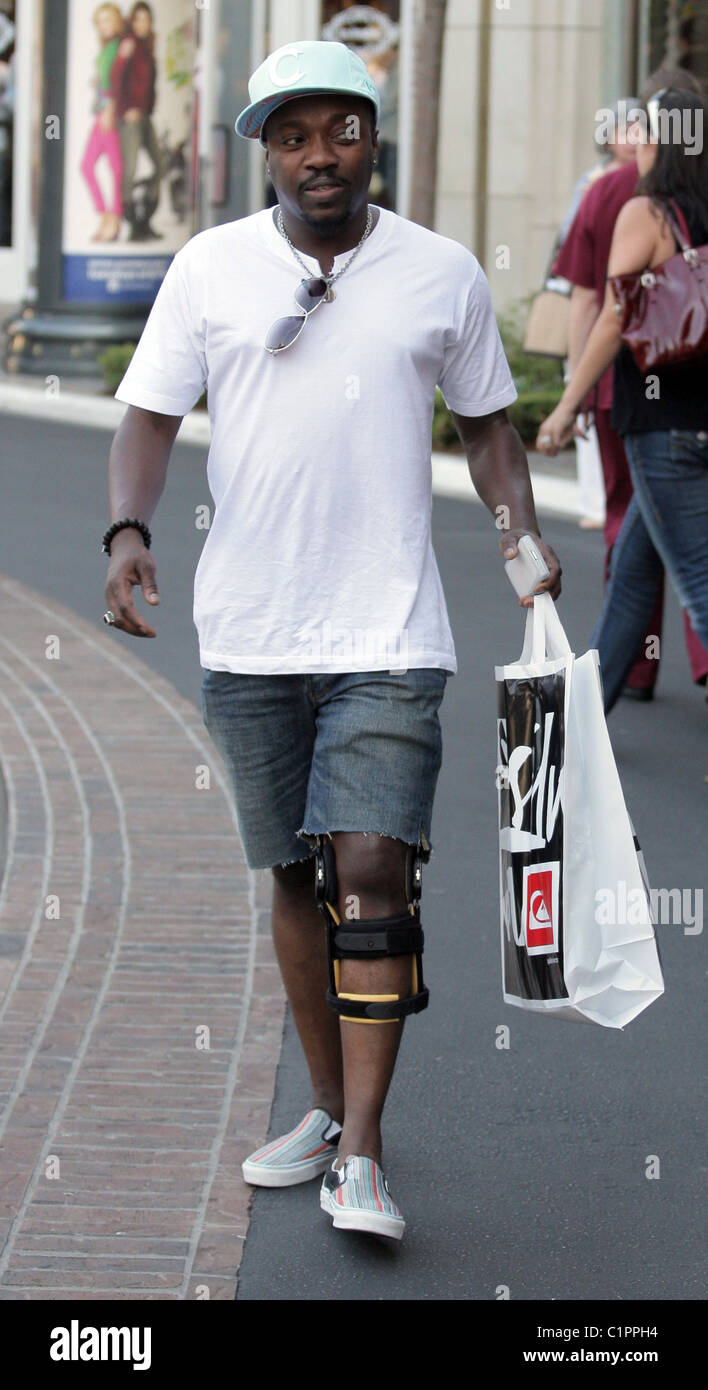 Derrick Hamilton out shopping with his son in Hollywood Los Angeles ...