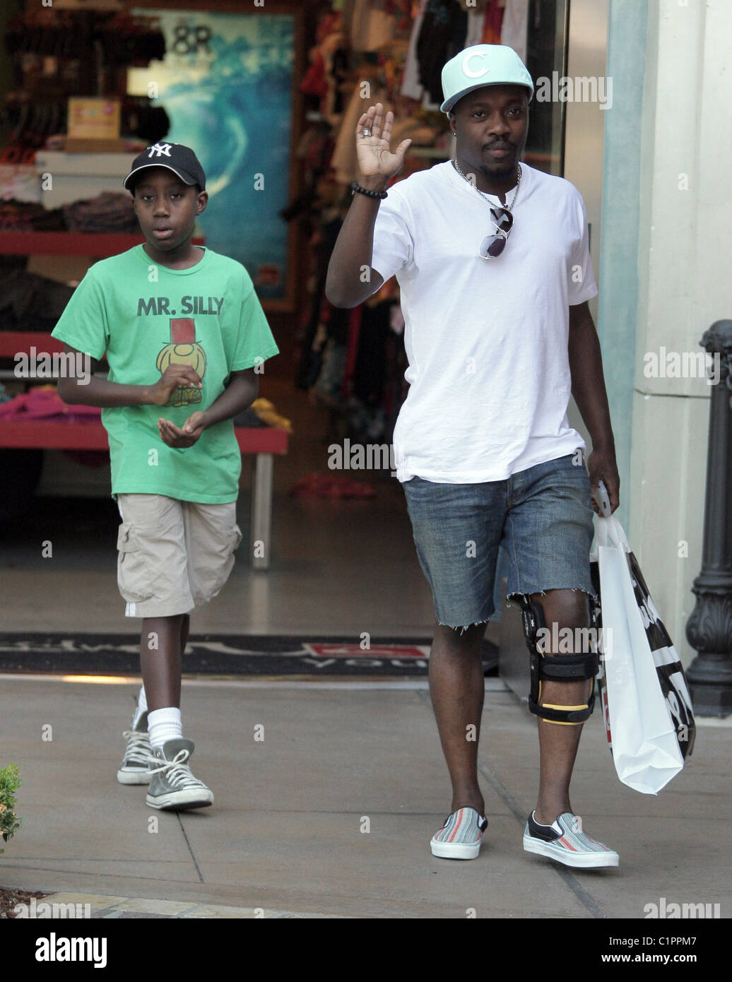 Derrick Hamilton out shopping with his son in Hollywood Los Angeles ...